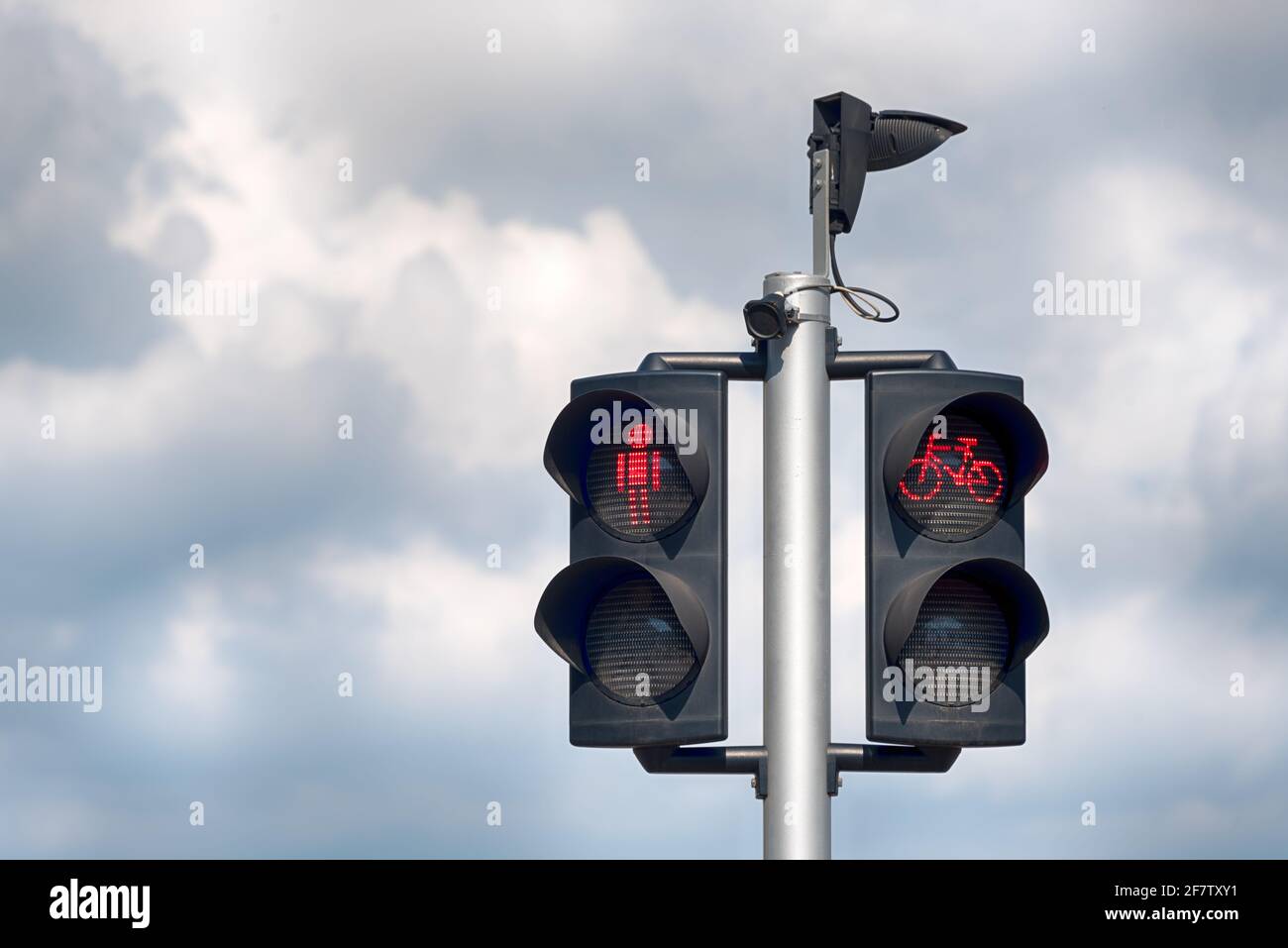 Red bicycle and pedestrian traffic lights. Red traffic light for bikes ...