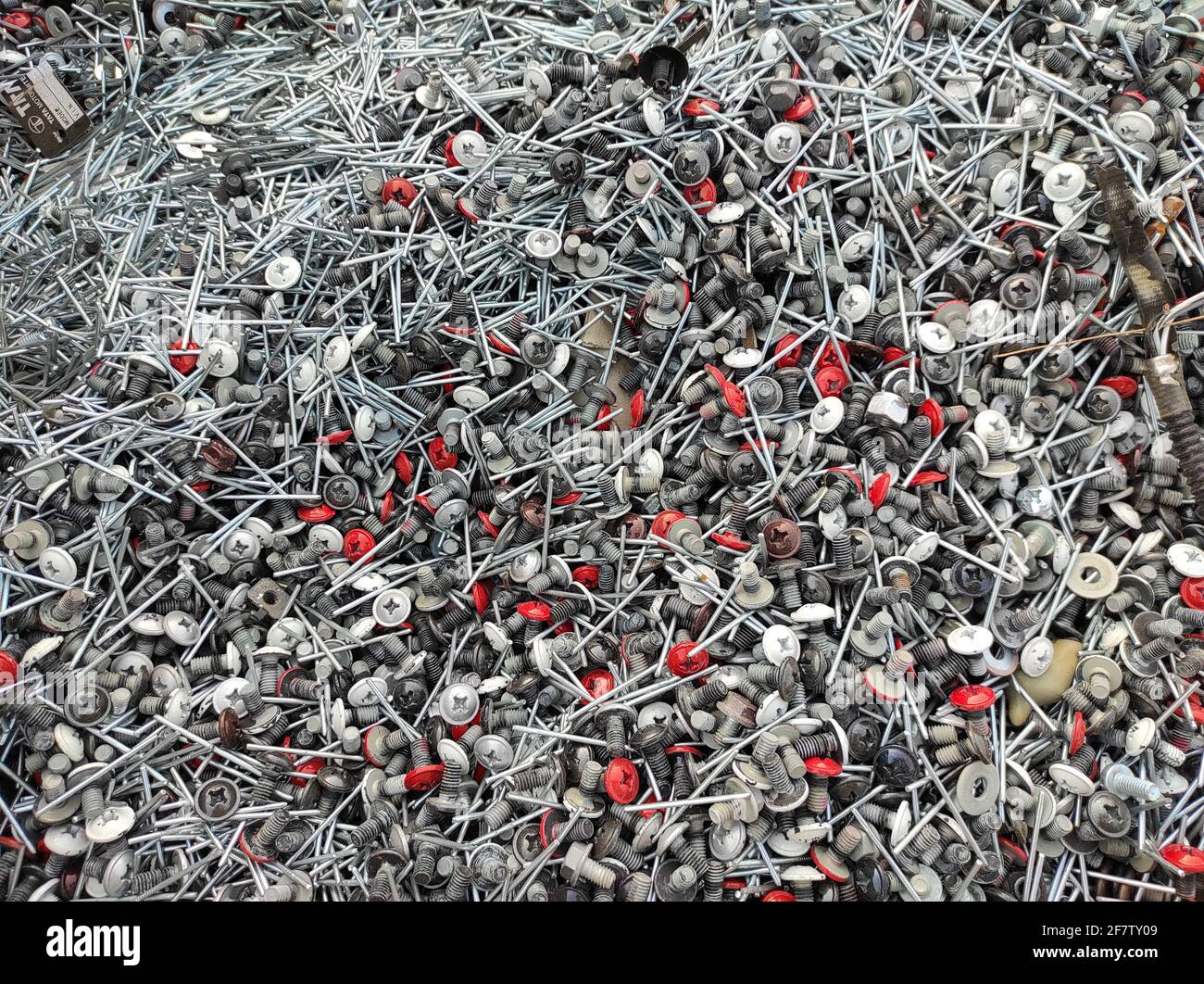 Bunch of bolts and nuts in a box Stock Photo - Alamy