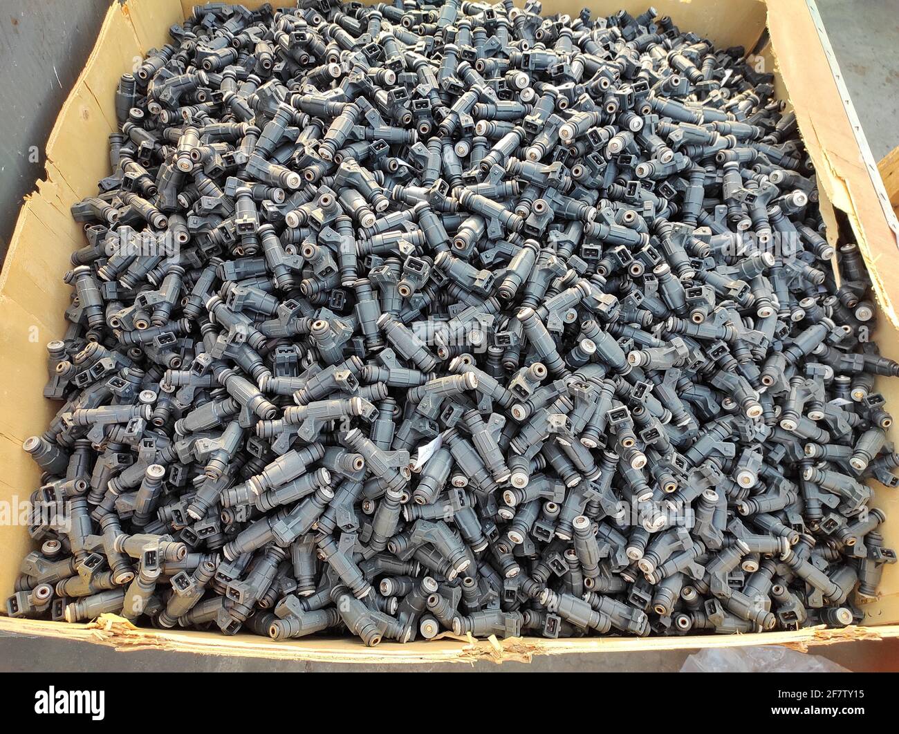Bunch of bolts and nuts in a cardboard box Stock Photo - Alamy