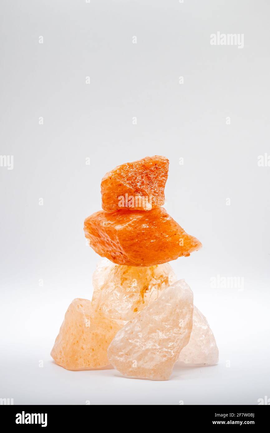 Large chunks of Himalayan sea salt are stacked on top of each other for ...