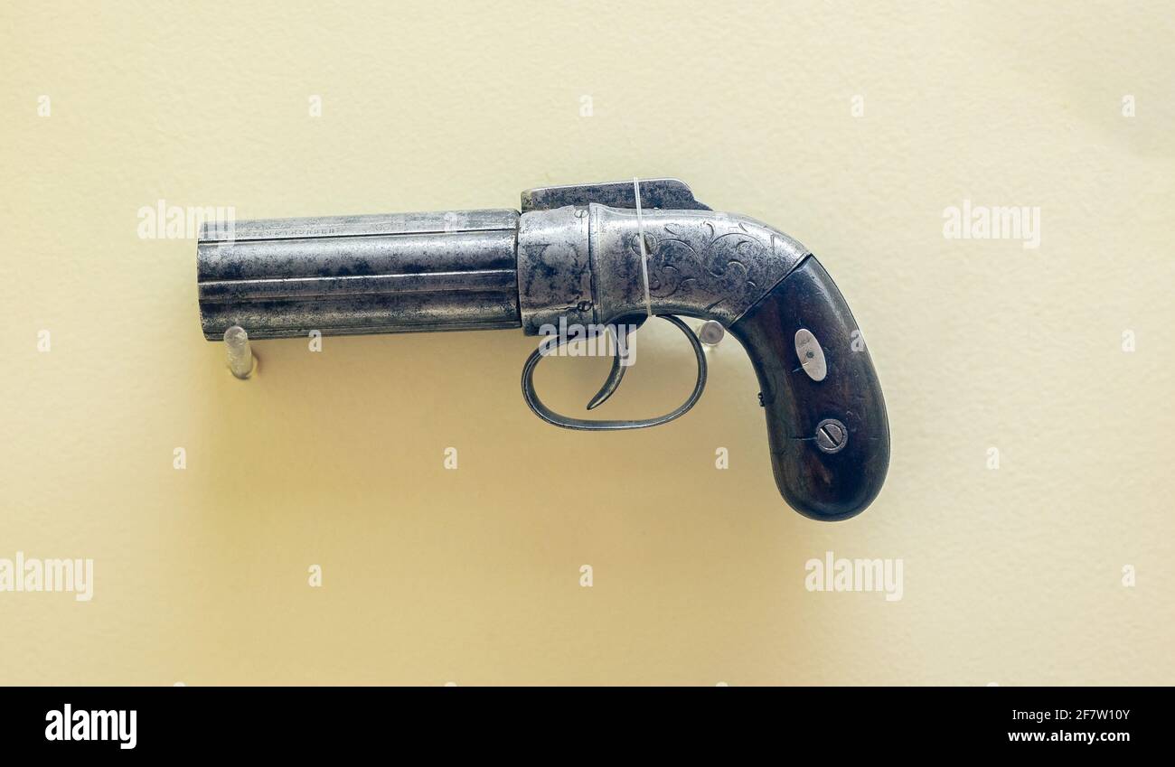 Closeup shot of an old vintage handgun on the white background Stock ...