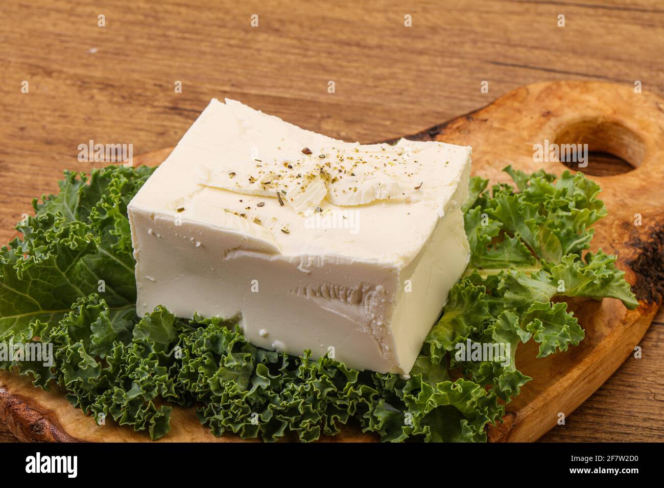 Traditional tasty Greek Feta soft cheese brick Stock Photo - Alamy