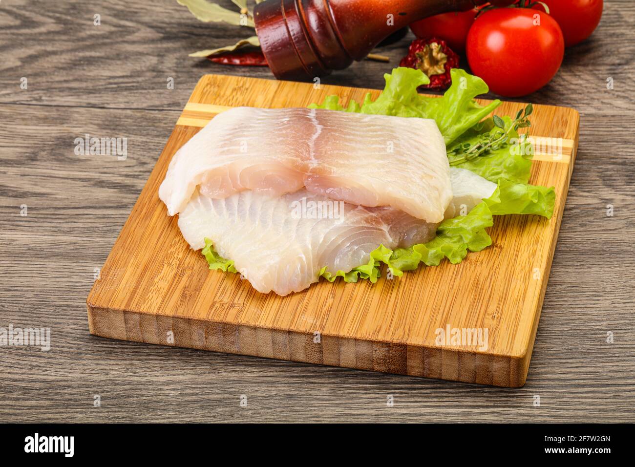 Raw pangasius fillet fish for cooking Stock Photo - Alamy