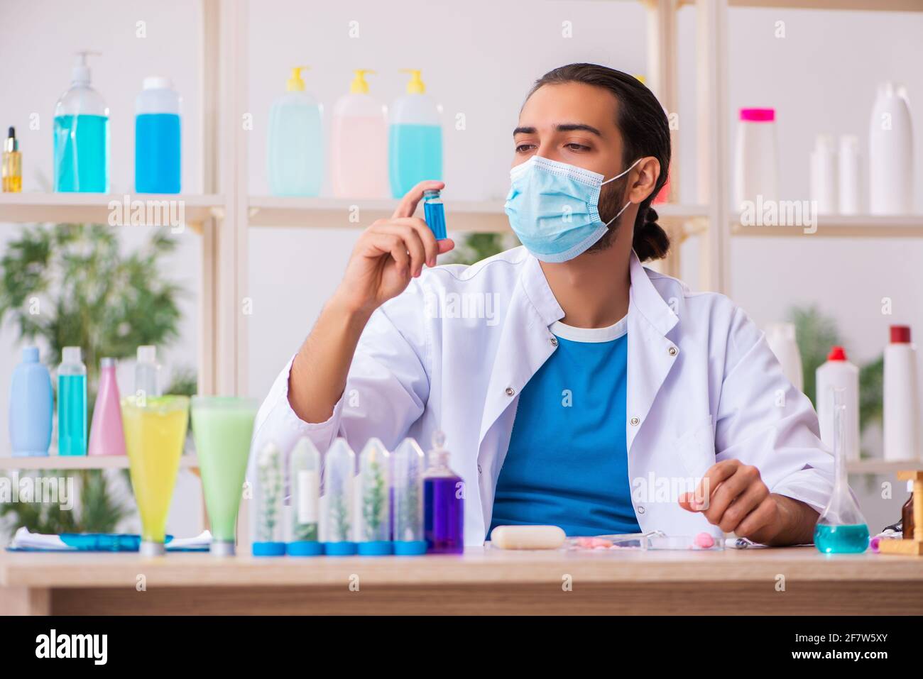 Young chemist testing soap in the lab Stock Photo - Alamy