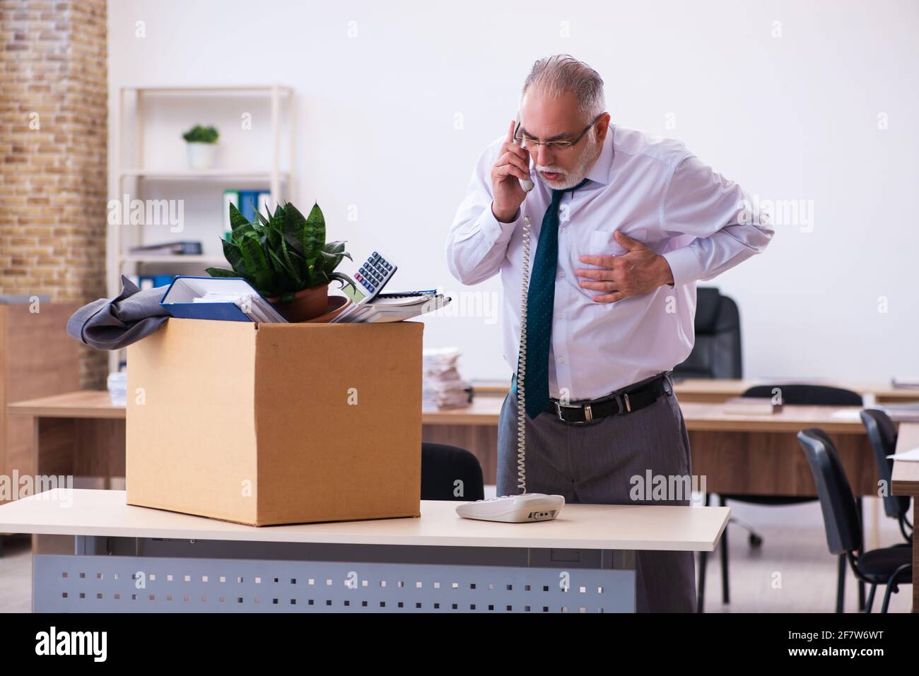 Old employee being fired from his work Stock Photo - Alamy