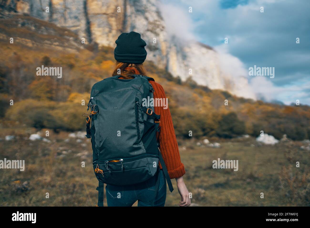 travel tourism woman with backpack high mountains sky landscape Stock ...