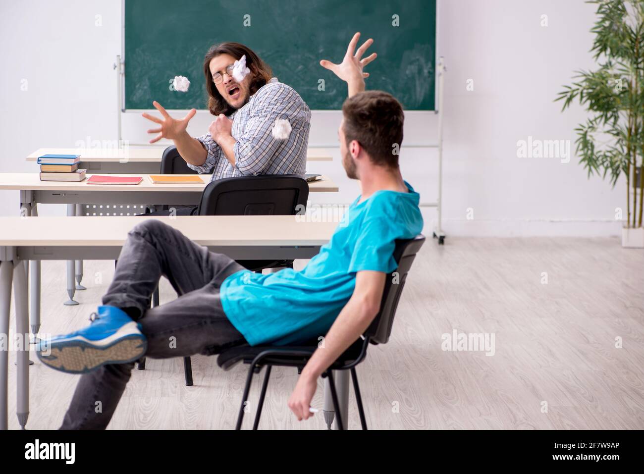 Boys fighting classroom hi-res stock photography and images - Alamy