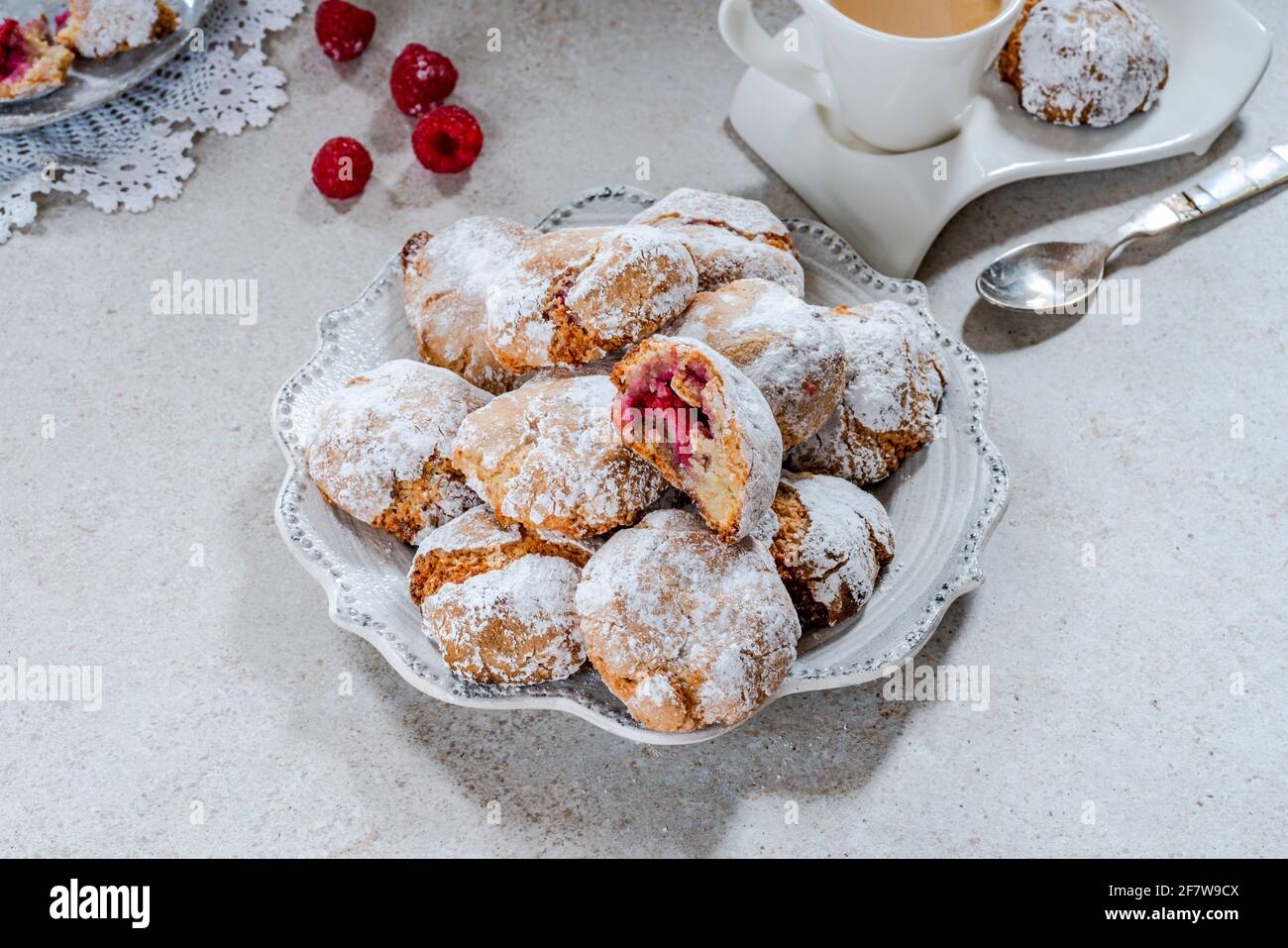 Raspberry amaretti biscuits - traditional Italian dessert Stock Photo ...