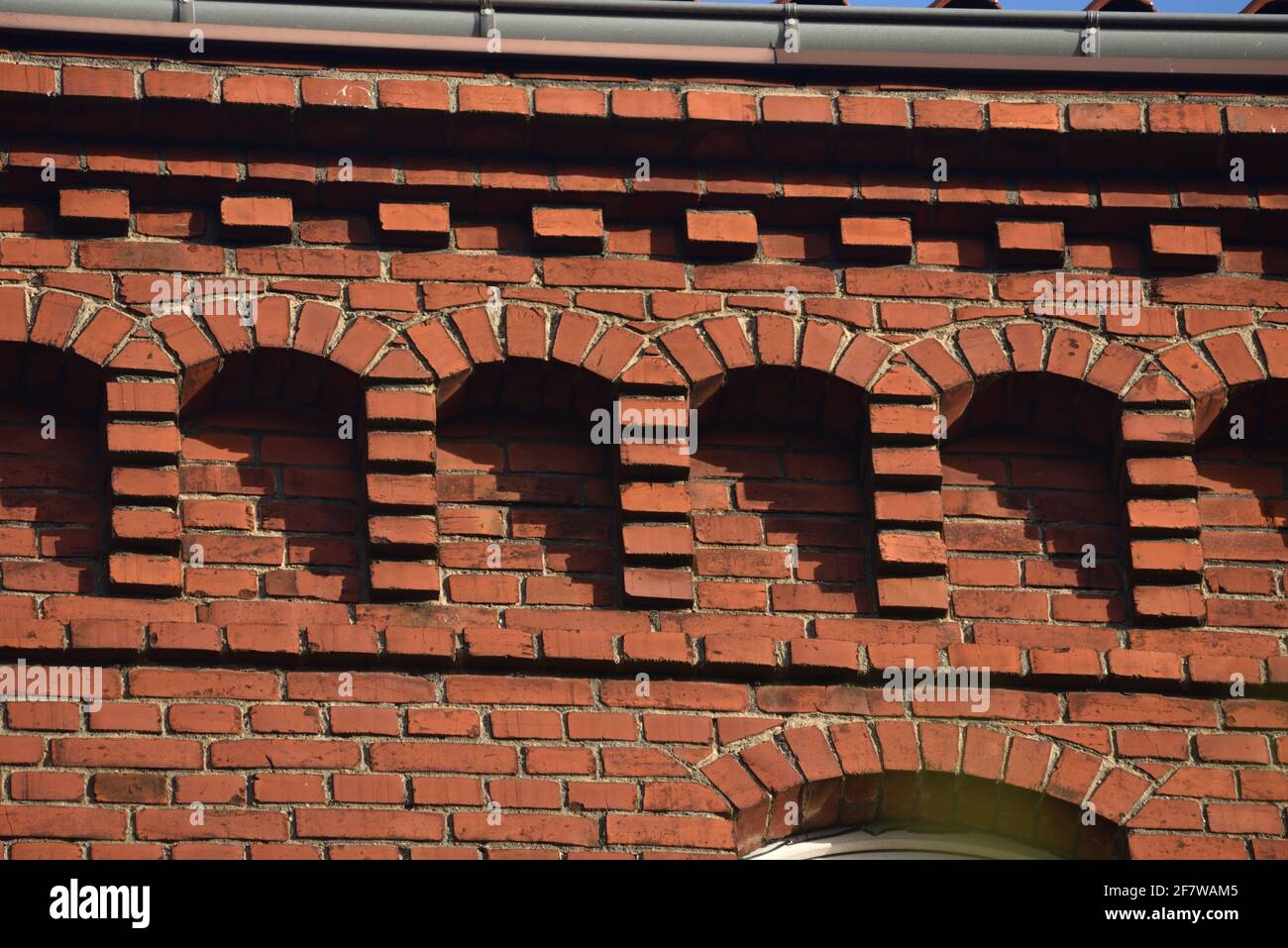 antique brick ornate cornice, beautiful arches and ledges Stock Photo ...