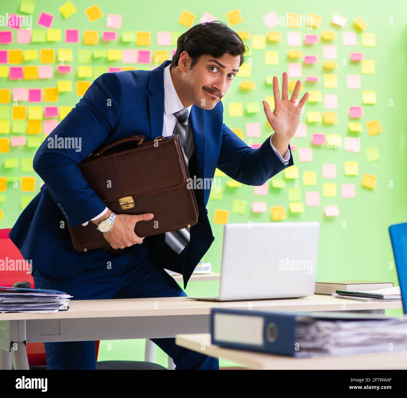 The businessman with many conflicting priorities Stock Photo - Alamy