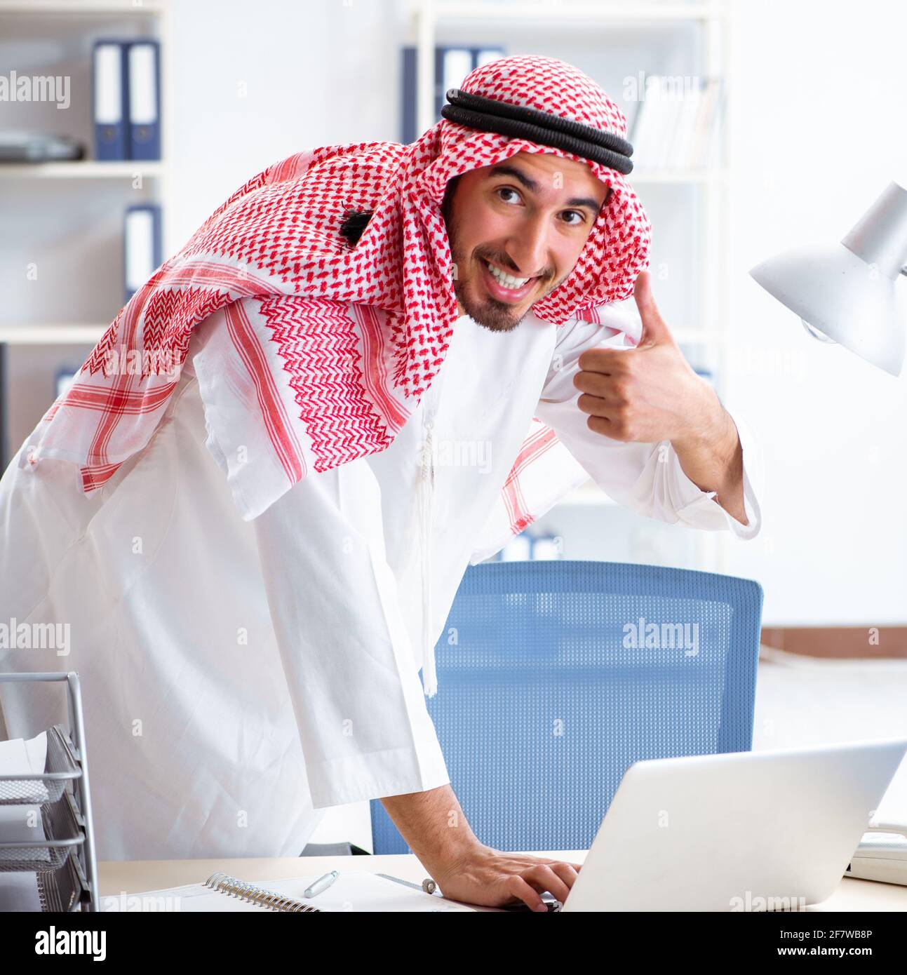 The arab businessman working in the office Stock Photo - Alamy
