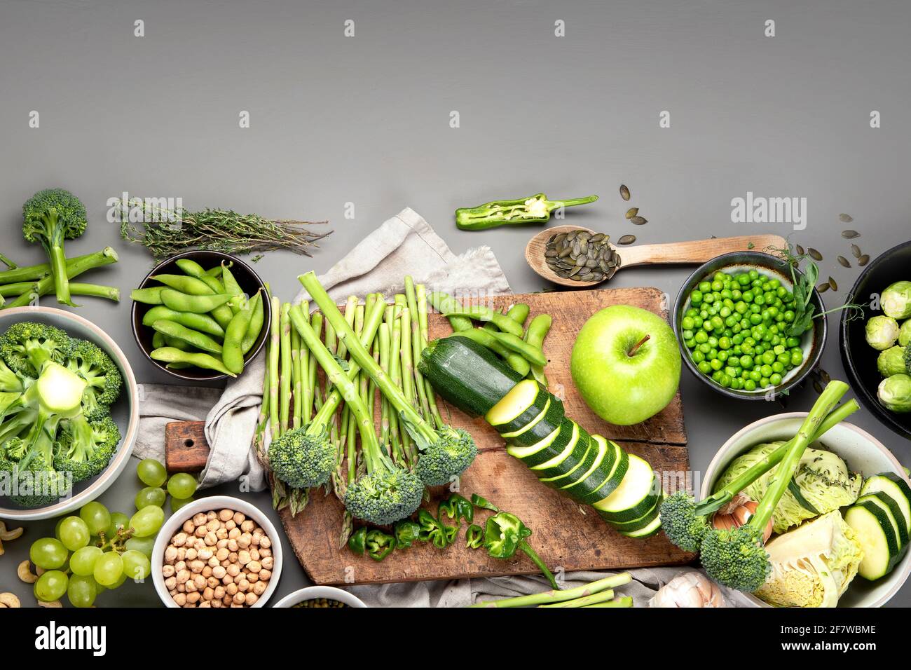 Set of various green vegetables and fruits like cabbage, broccoli ...