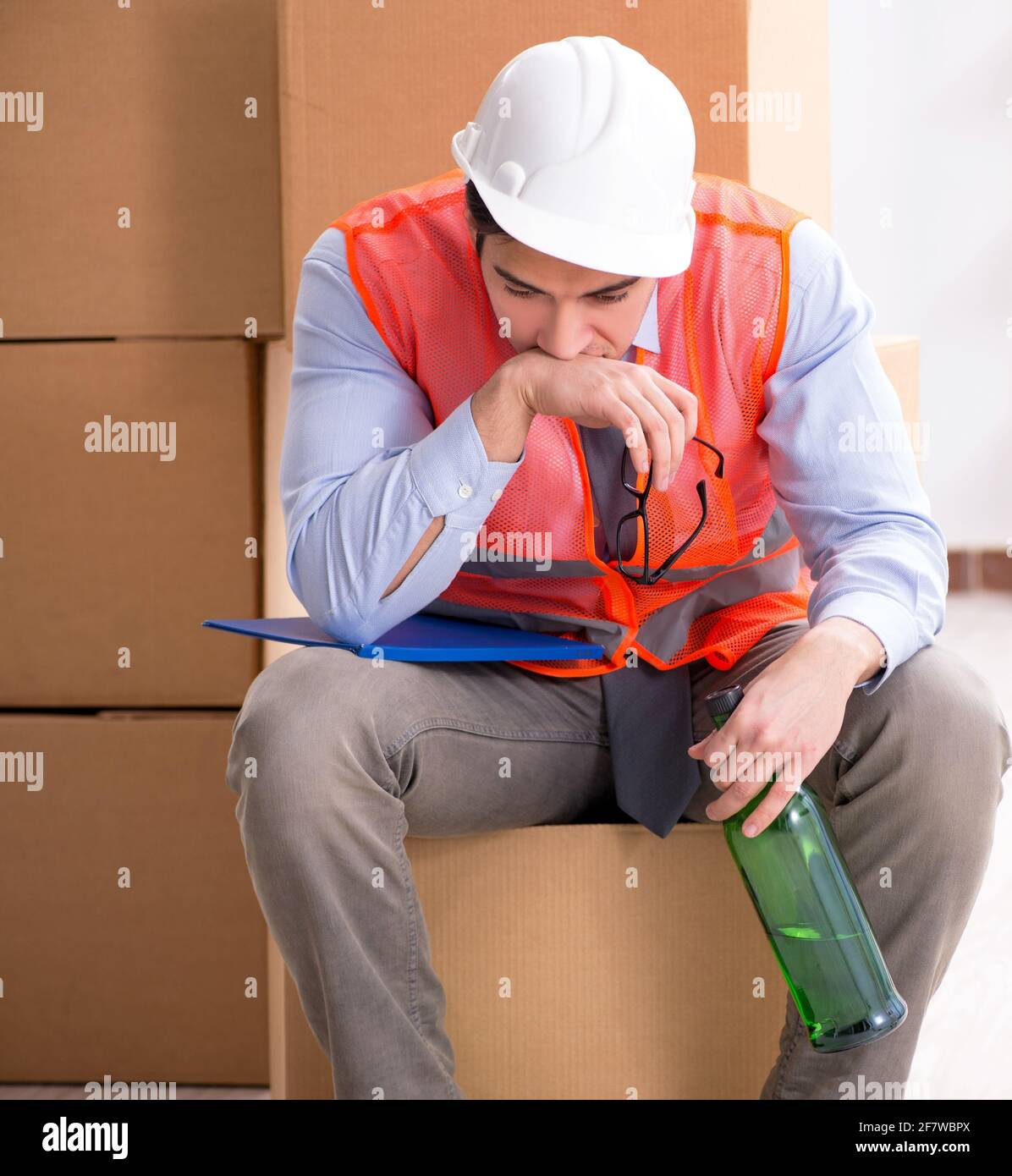 The delivery man drunk at work Stock Photo - Alamy