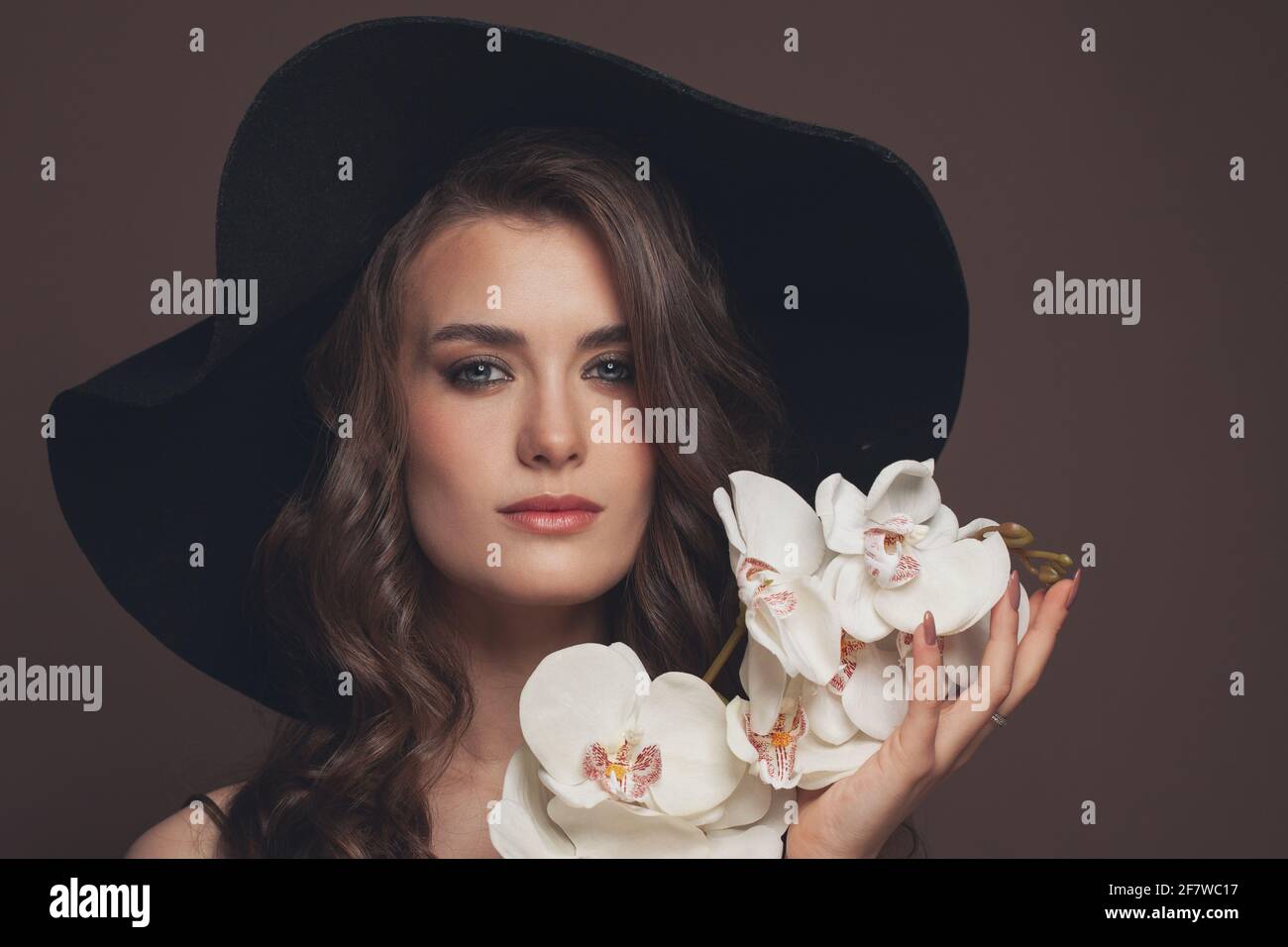 Portrait of nice beauty woman with white flowers portrait Stock Photo ...
