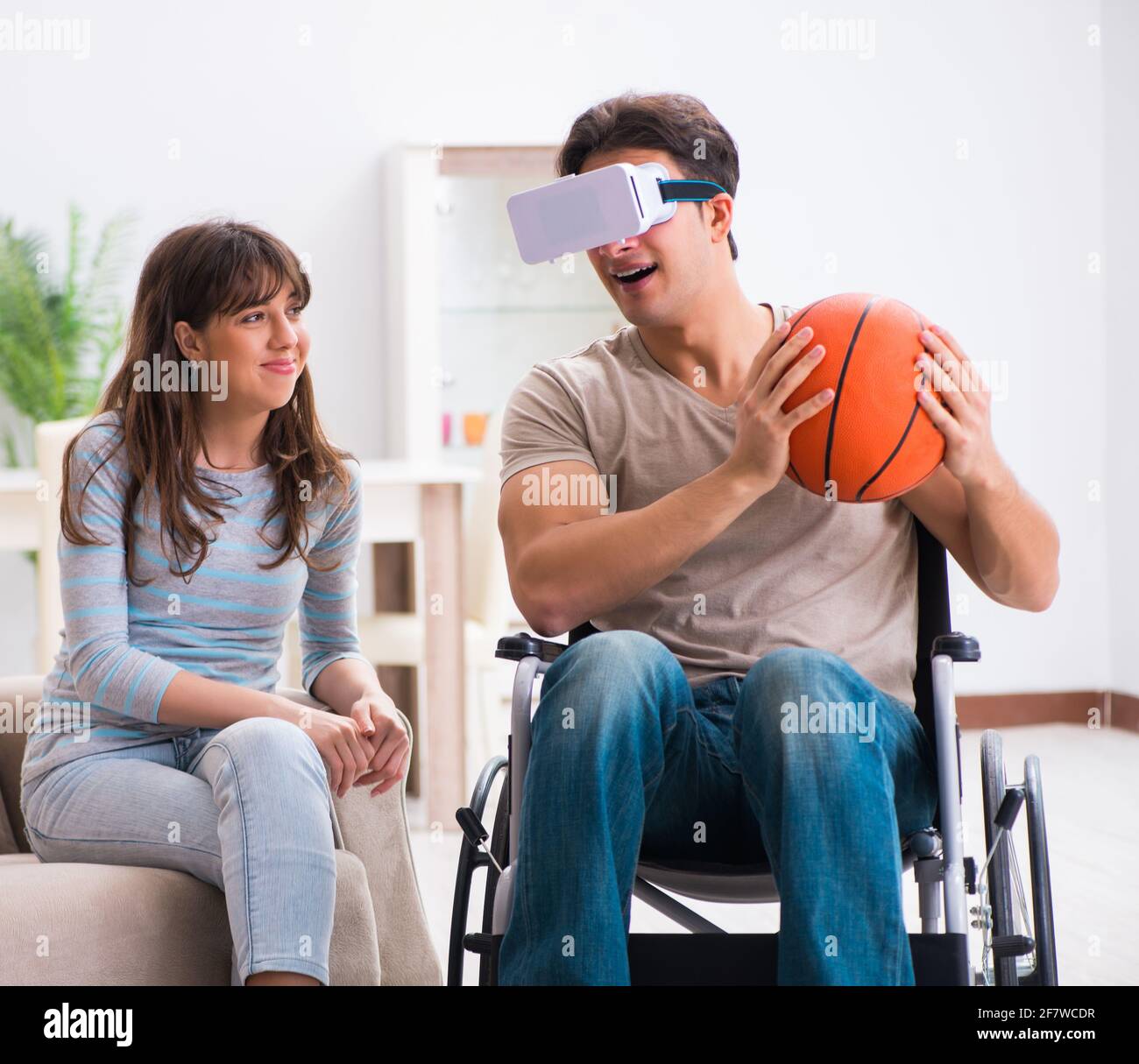 The disabled man with virtual glasses Stock Photo - Alamy