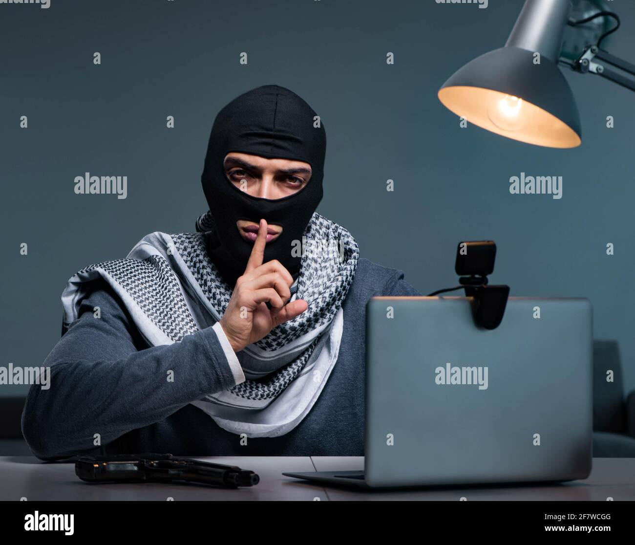 The hacker wearing balaclava mask hacking computer Stock Photo - Alamy