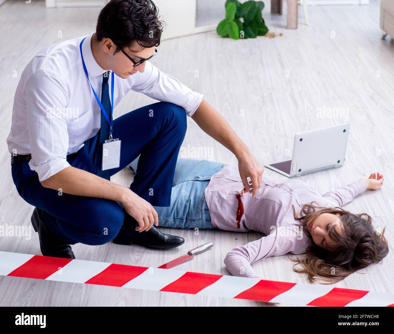 Forensic investigator at the crime scene investigating woman murder ...