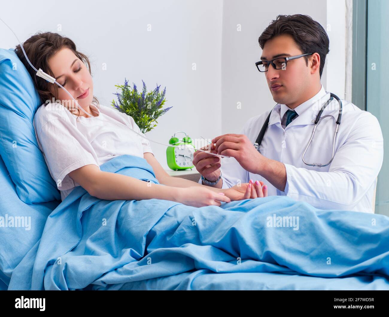The doctor doing medical injection in hospital room Stock Photo - Alamy