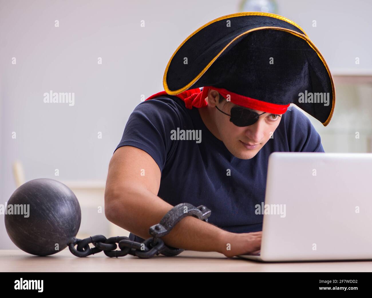 The digital security concept with pirate at computer Stock Photo - Alamy