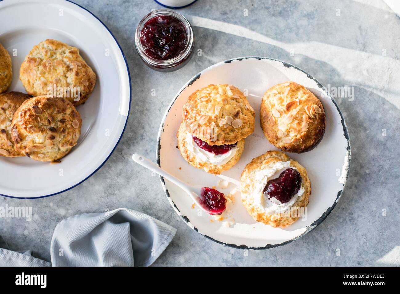 Traditional British Scones with clotted cream, raspberry jam Stock ...