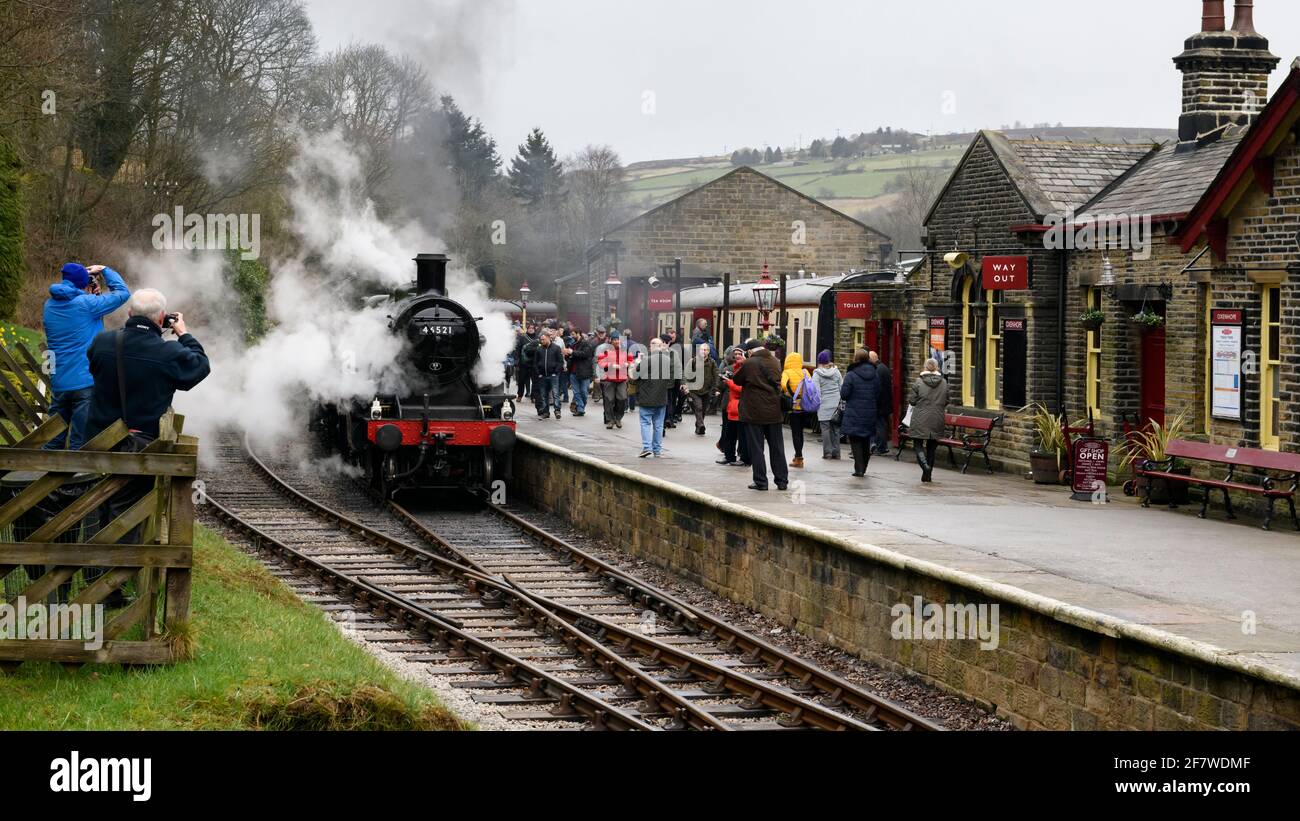 People (enthusiasts & fans) on platform & historic steam train loco LMS ...