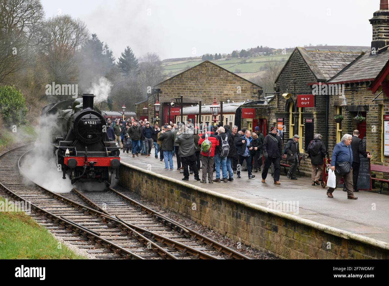 People (enthusiasts & fans) on platform & historic steam train loco LMS ...