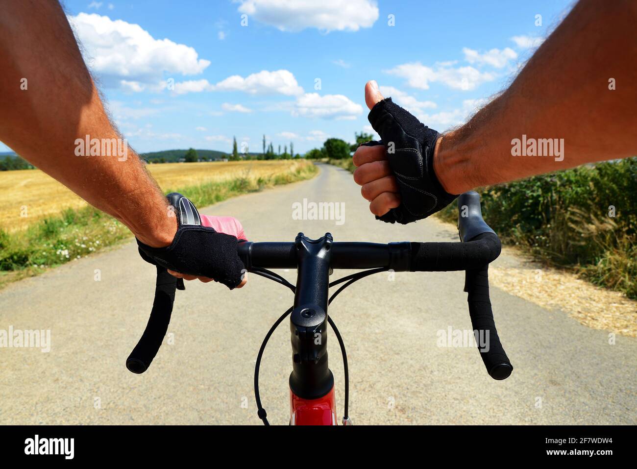Hands holding handlebar bicycle hi-res stock photography and images - Alamy
