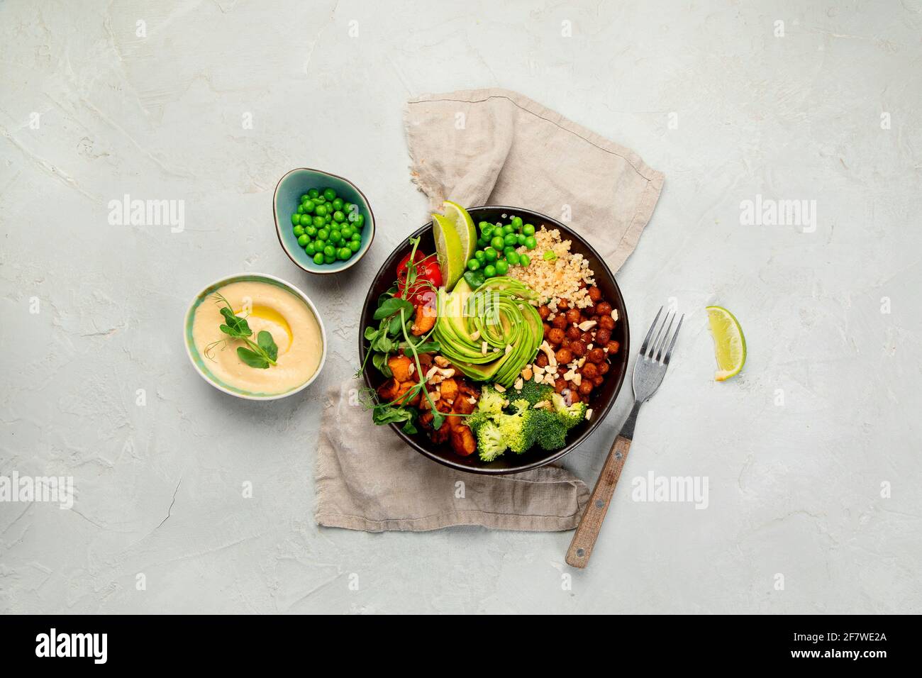 Buddha bowl of mixed grilled vegetables on light background. Healthy eating concept. Top view ...