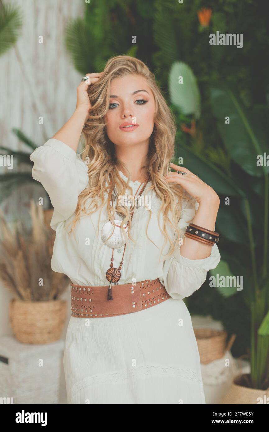 Fashion model woman in white wear in tropical resort Stock Photo - Alamy