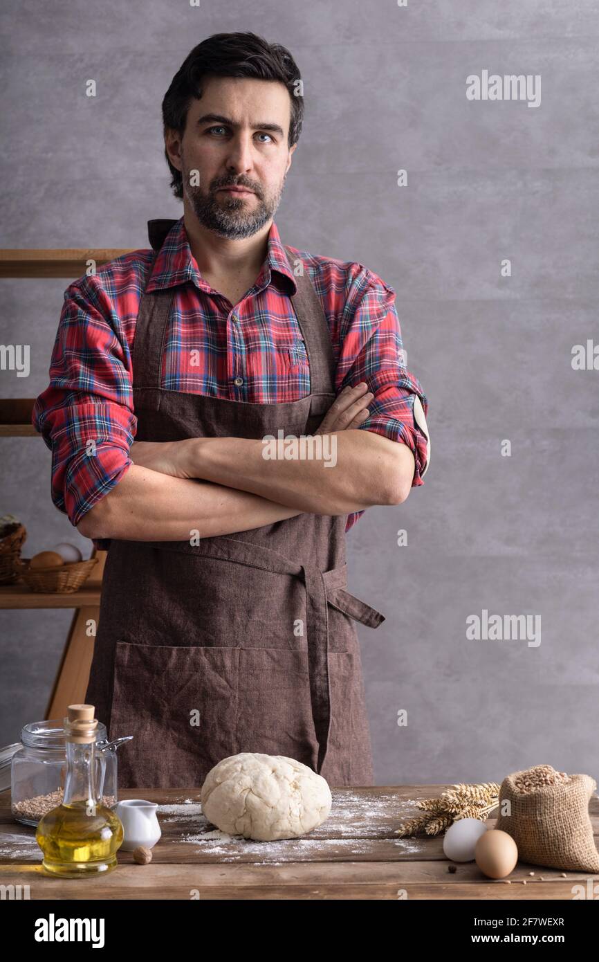 Baker man making dough and bakery ingredients for homemade bread ...