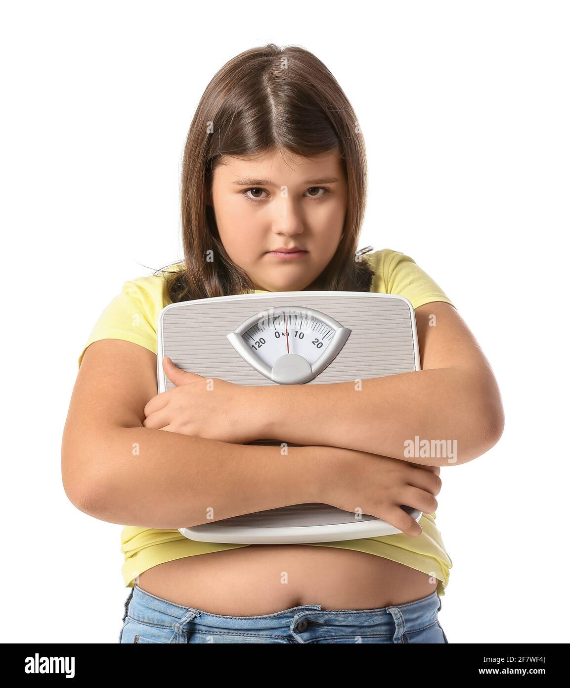 Sad overweight girl with measuring scales on white background Stock ...