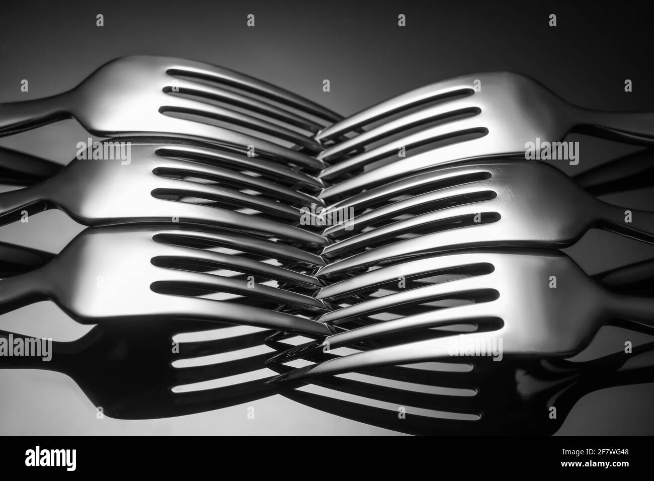 Creative composition with stylish forks on dark background Stock Photo ...