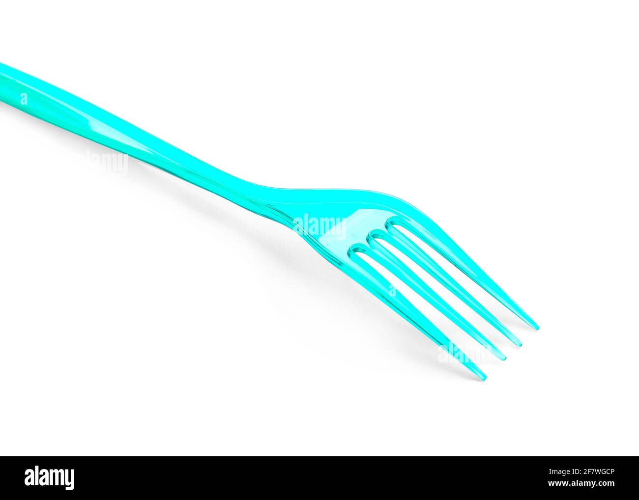 Plastic fork on white background Stock Photo - Alamy