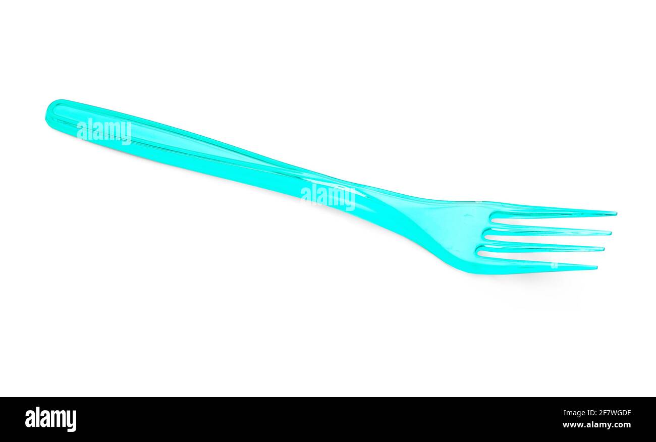 Plastic fork on white background Stock Photo - Alamy