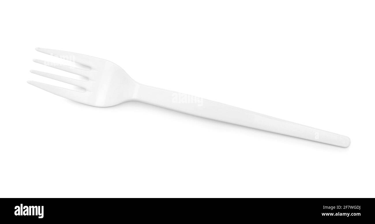Plastic fork on white background Stock Photo - Alamy