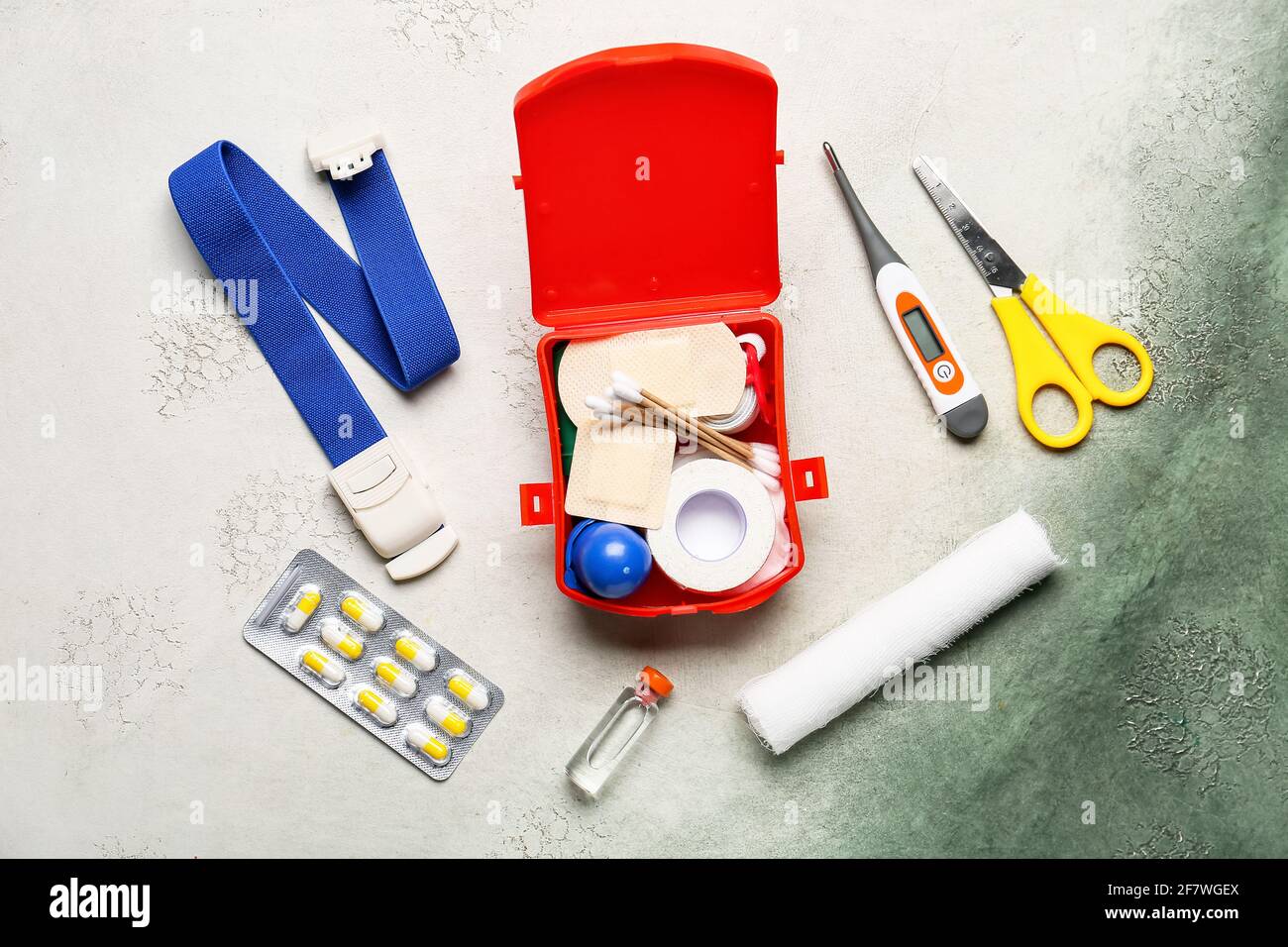 First aid kit on light background Stock Photo - Alamy