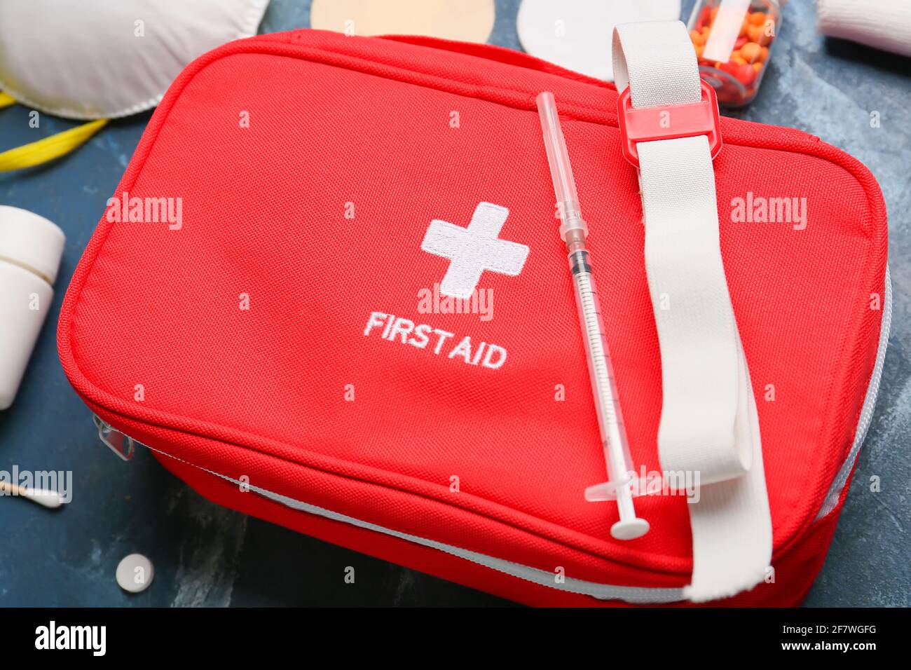 First aid kit on color background, closeup Stock Photo - Alamy