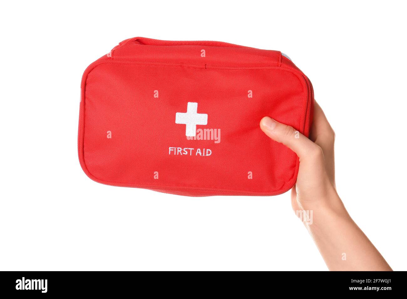 Female hand with first aid kit on white background Stock Photo - Alamy