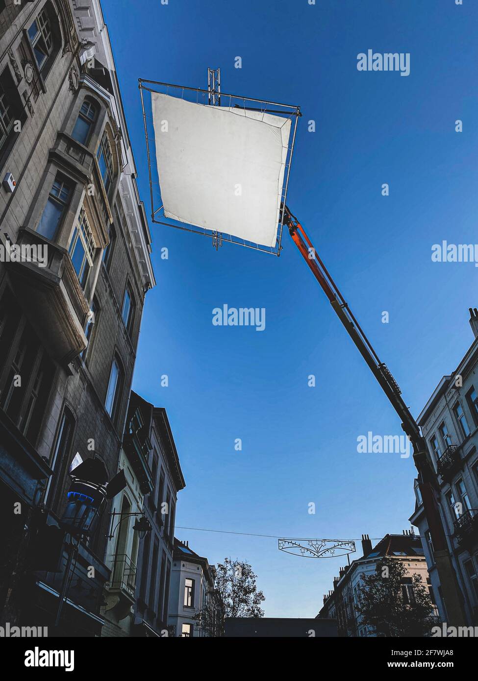 Shooting production, Process of filming. Spotlight illuminates large ...