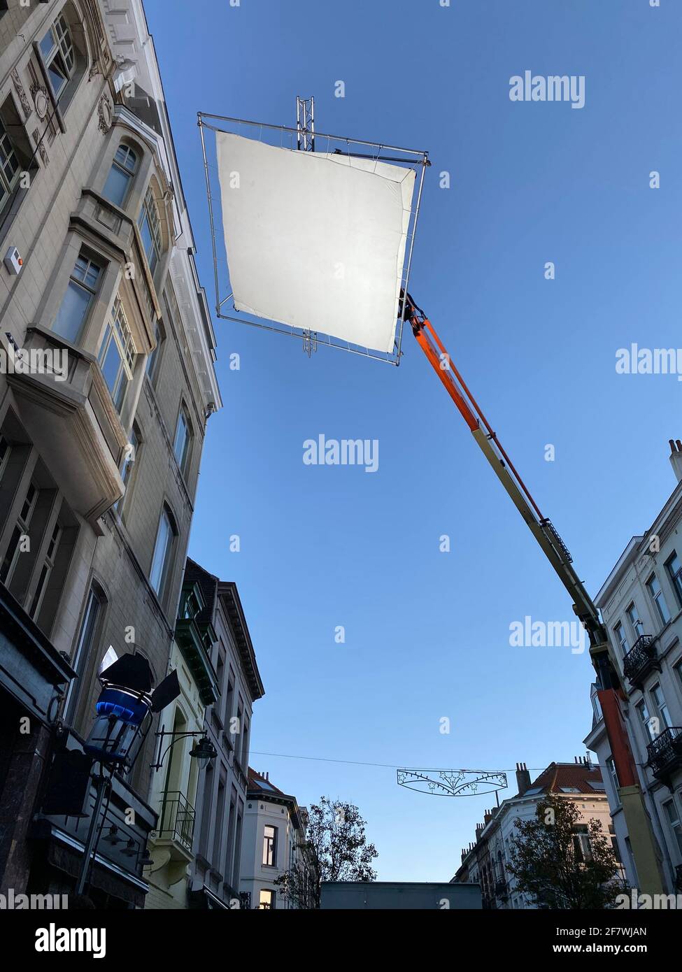 Shooting production, Process of filming. Spotlight illuminates large ...