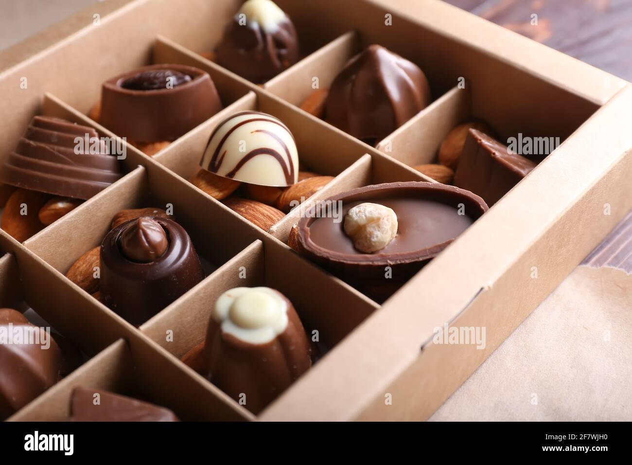 Box with tasty chocolate candies, closeup Stock Photo - Alamy