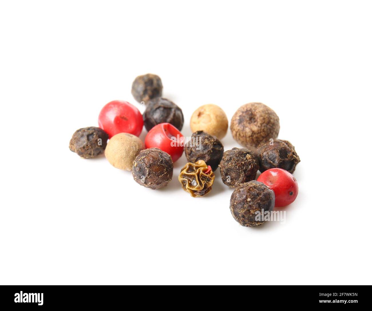 Mixed peppercorns on white background Stock Photo - Alamy