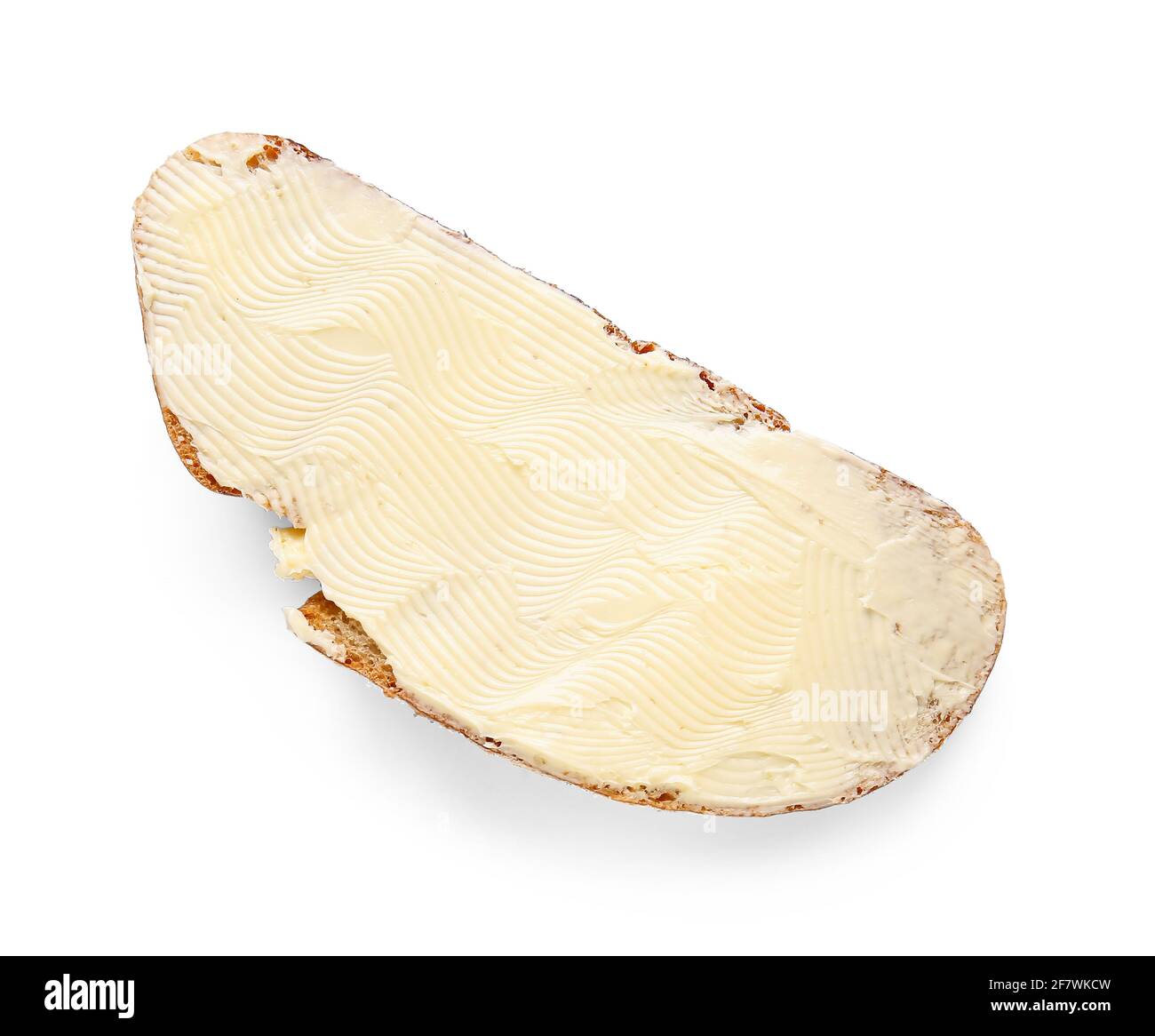 Slice of fresh bread with butter on white background Stock Photo - Alamy