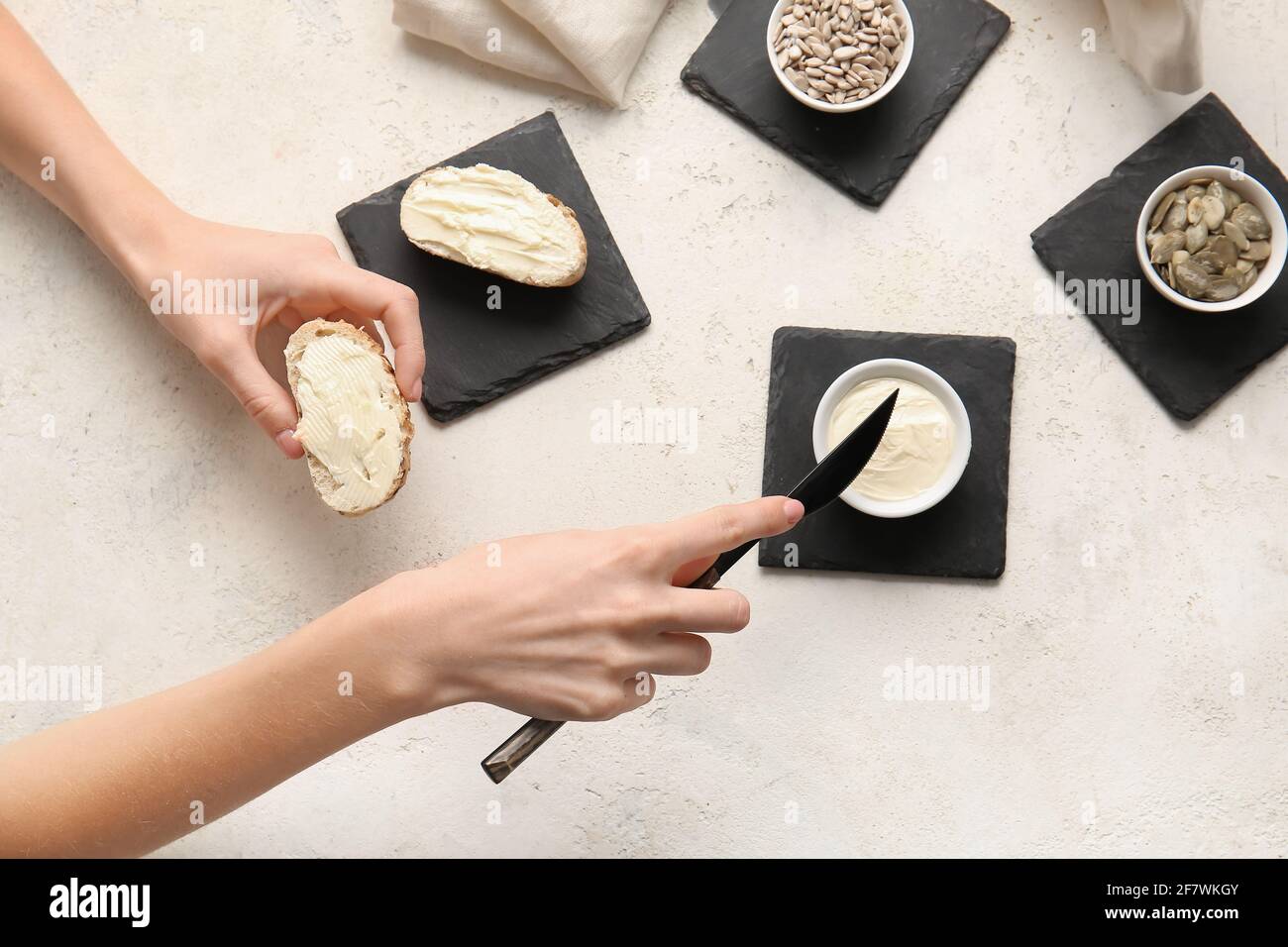 Person spreading butter on top hi-res stock photography and images - Alamy
