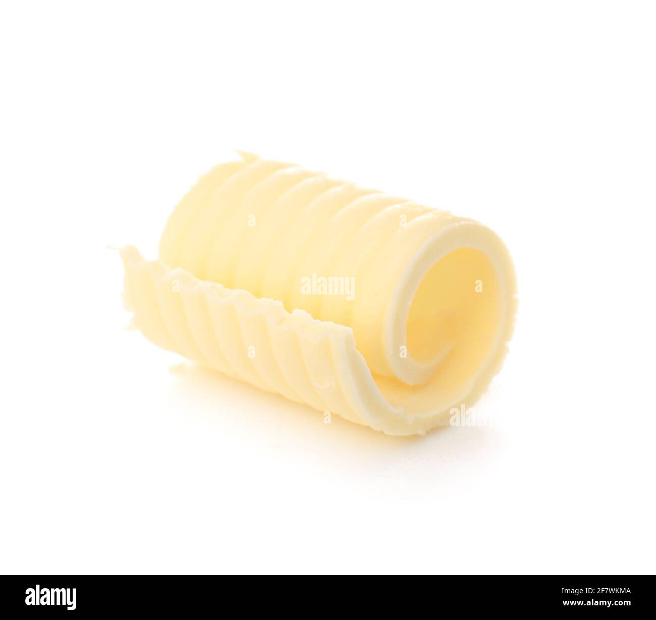 Curl of fresh butter on white background Stock Photo - Alamy