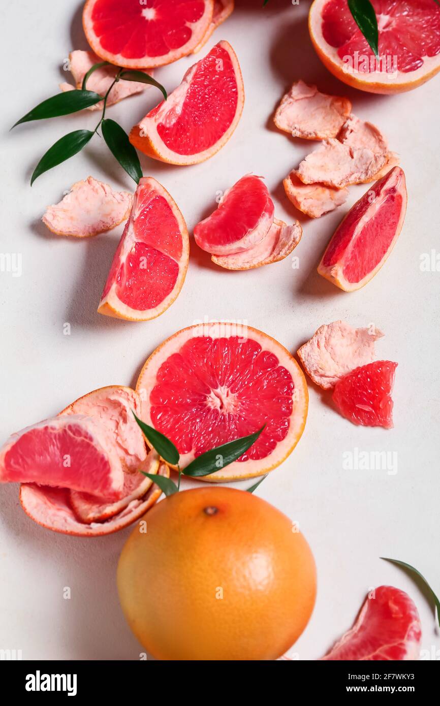 Composition with ripe grapefruits on white background Stock Photo - Alamy