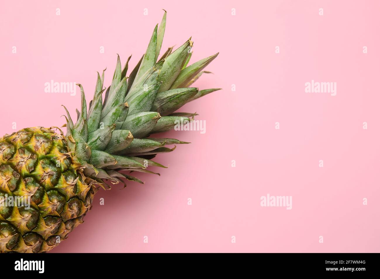Fresh pineapple on color background Stock Photo - Alamy