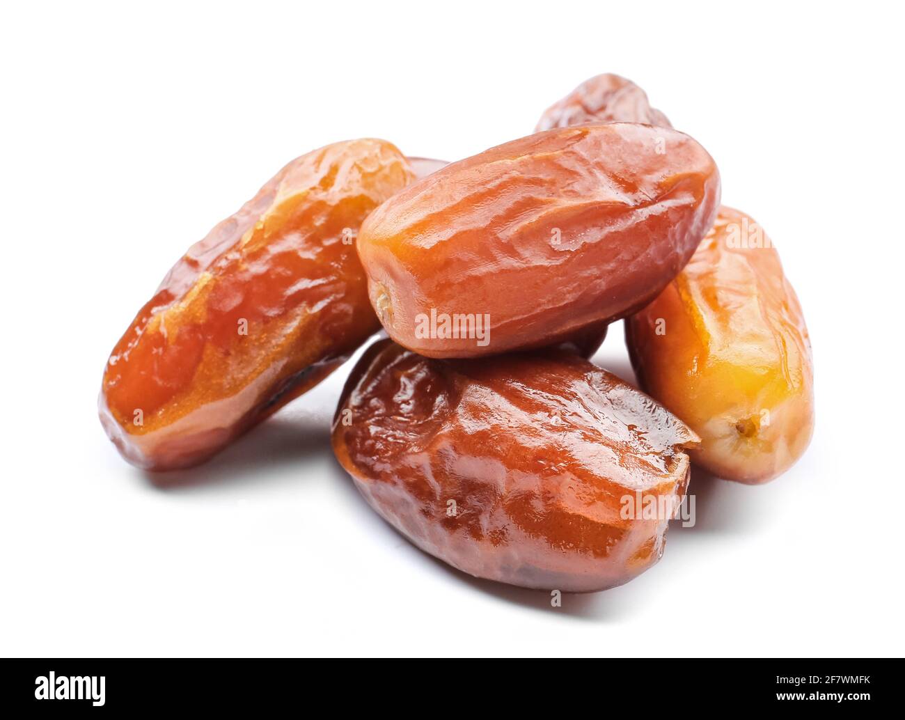 Sweet dried dates on white background Stock Photo - Alamy