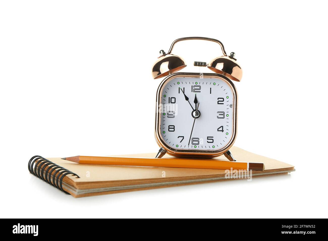 Alarm clock, notebook and pencil on white background Stock Photo - Alamy