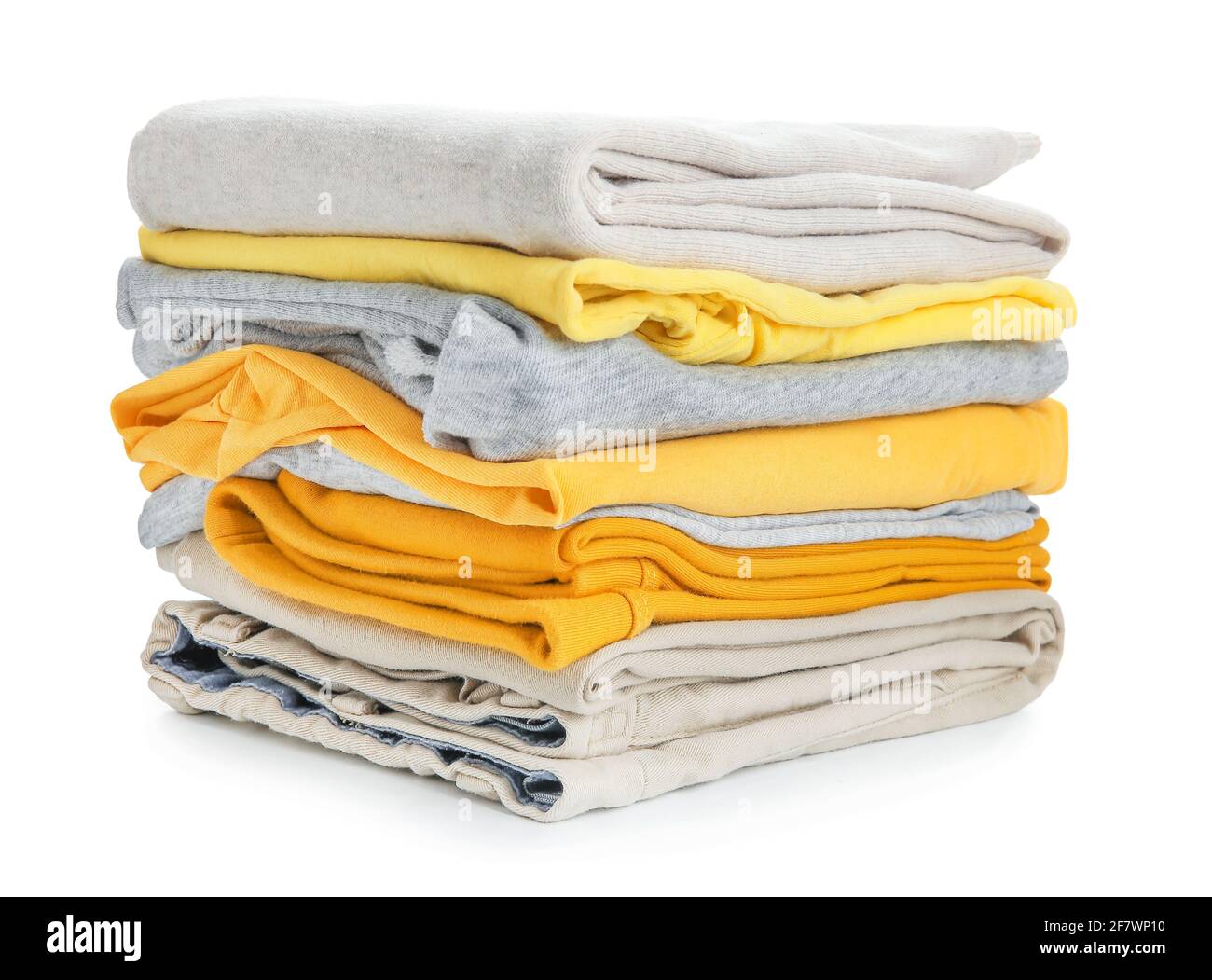Stack of stylish clothes on white background Stock Photo - Alamy